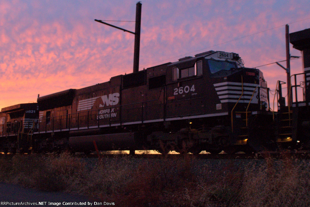 NS SD70M 2604 trails on 17G